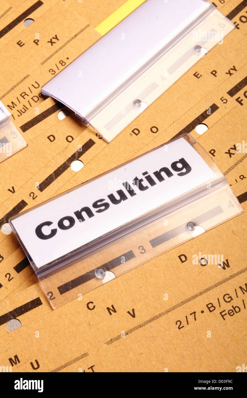 consulting word on business office folder rider showing financial ...