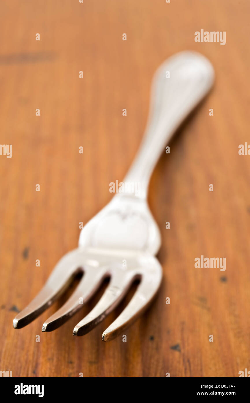 Antique fork at close up - very shallow depth of field Stock Photo - Alamy