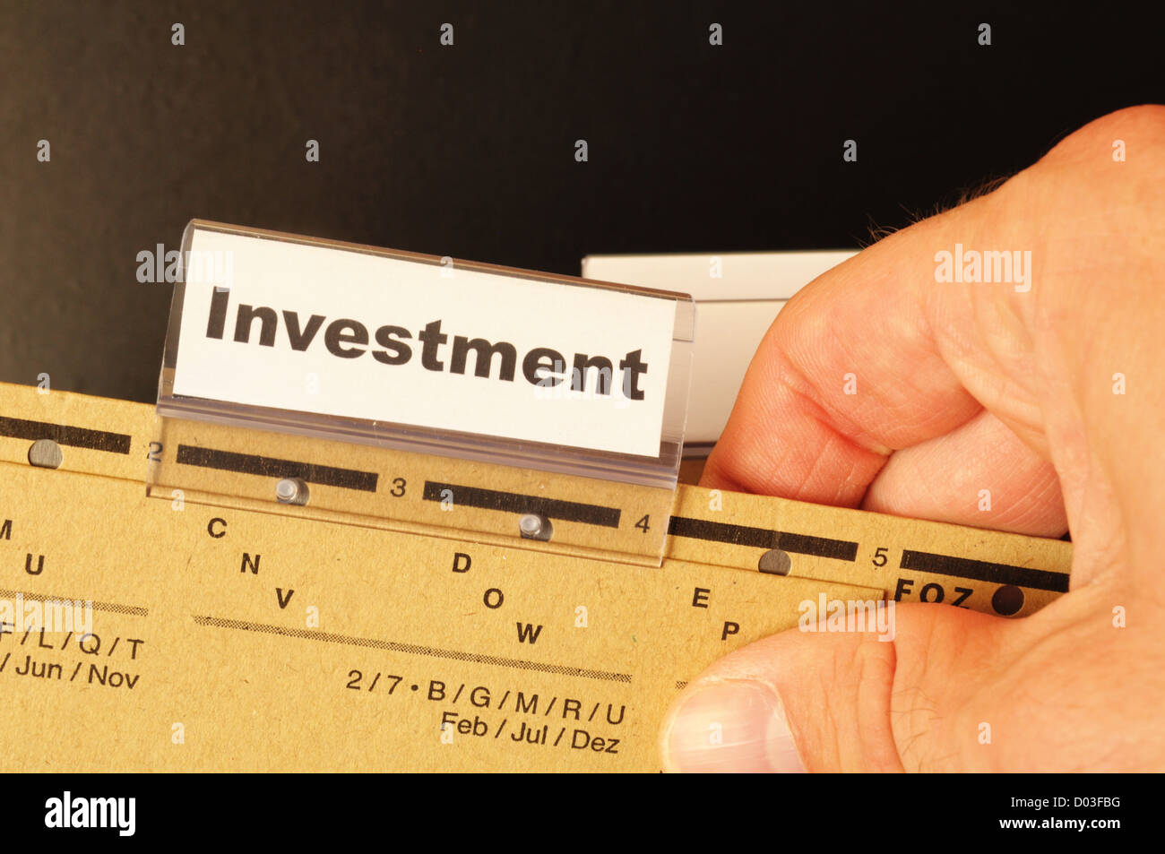 investment word on business folder showing financial success concept ...