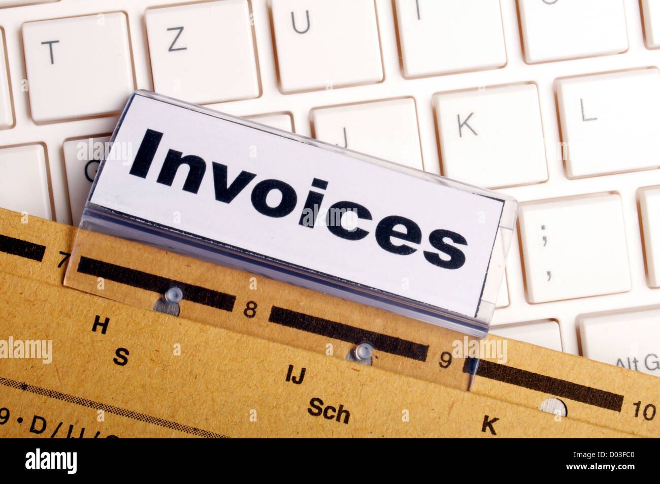 invoice or invoices concept with business folder in office showing ...