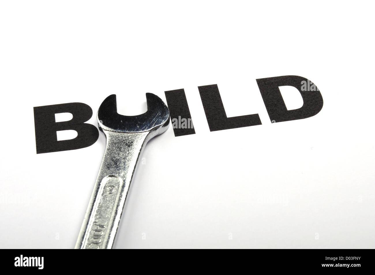 build and tools showing construction concept with word Stock Photo - Alamy
