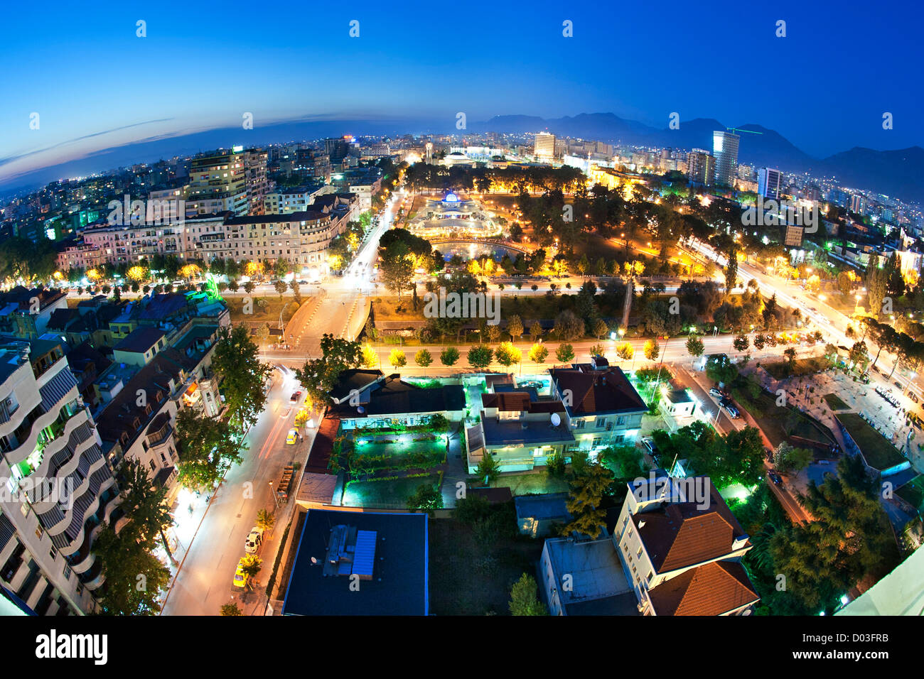 Dusk view of Tirana, the capital of Albania. In the centre is Rinia ...