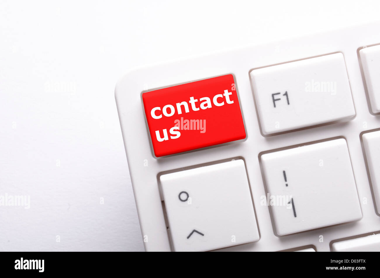 word contact us on red keyboard key Stock Photo - Alamy