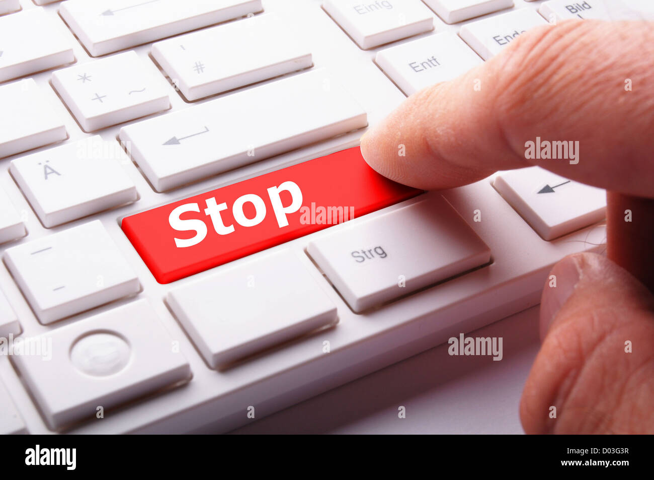 stop key on keyboard in red showing halt concept Stock Photo - Alamy