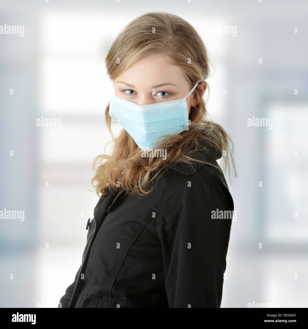 A model wearing a mask to prevent 'Swine Flu' infection. Isolated Stock ...