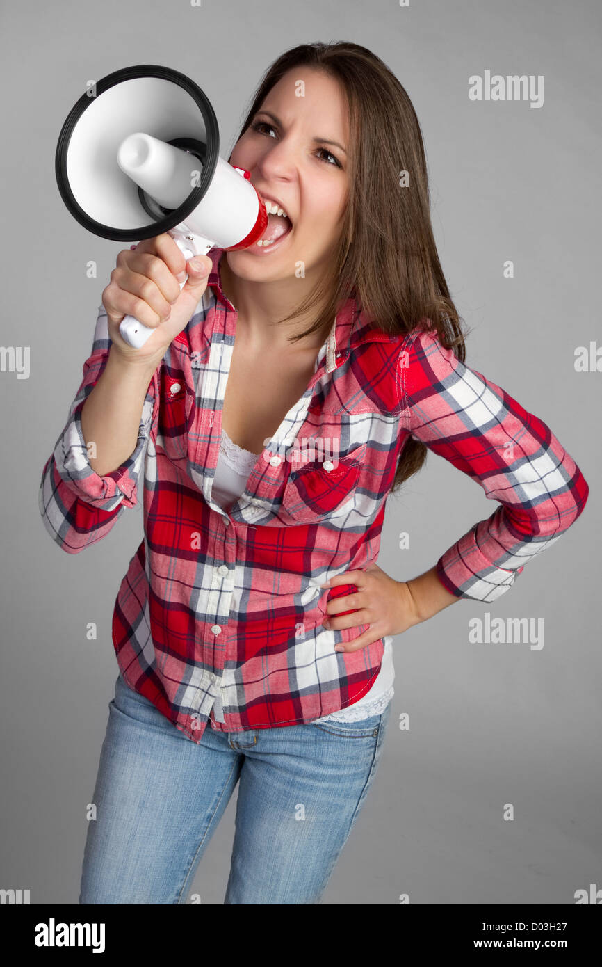 Beautiful megaphone bullhorn woman yelling Stock Photo - Alamy