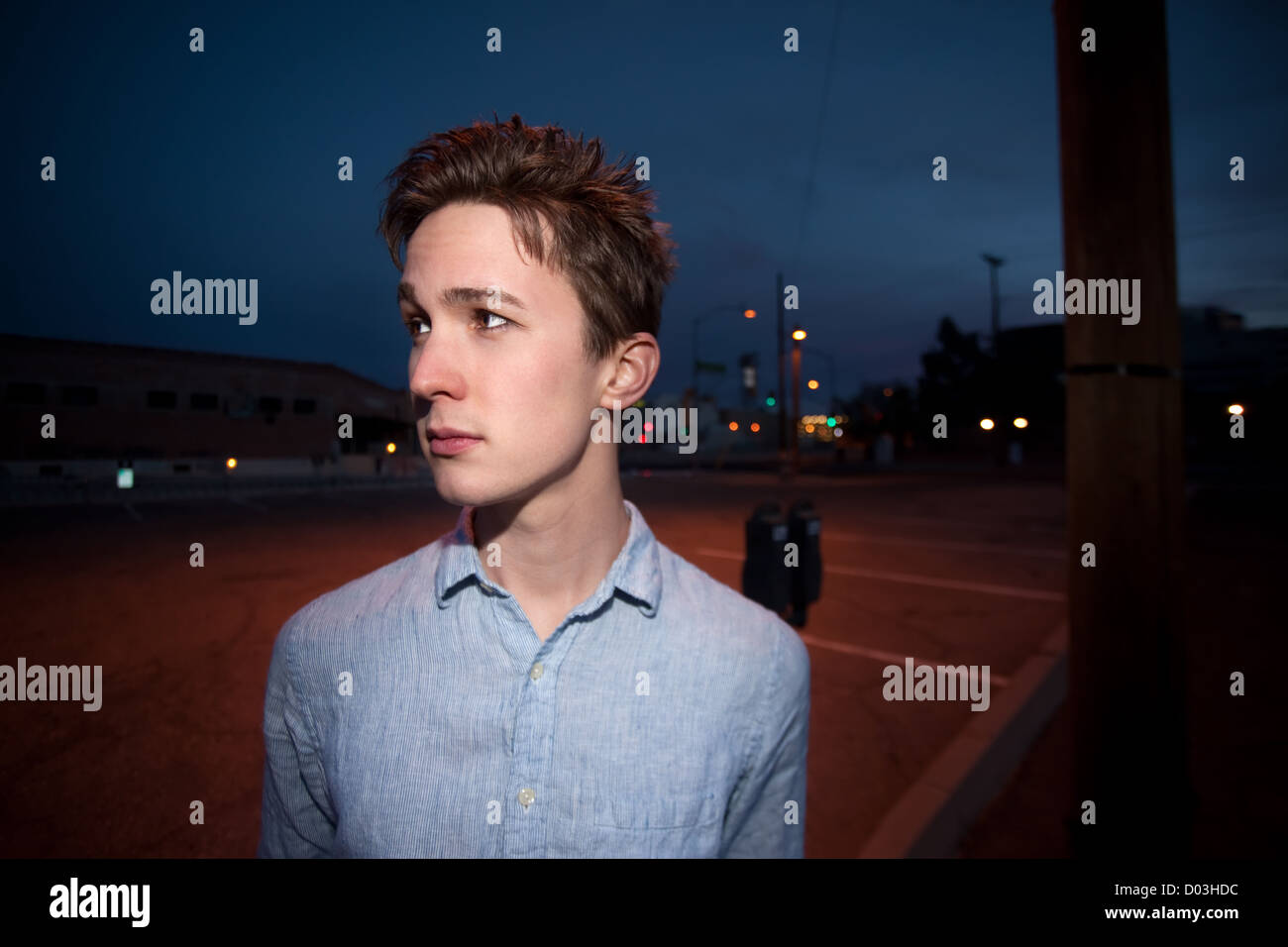 Alone young Caucasian man outside at night Stock Photo - Alamy