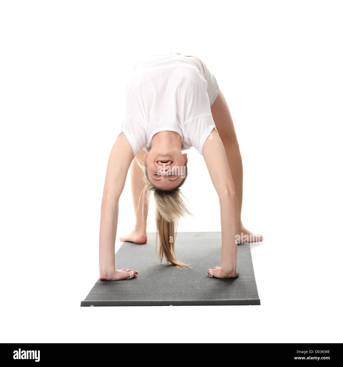 Young woman exercising isolated on white background Stock Photo - Alamy