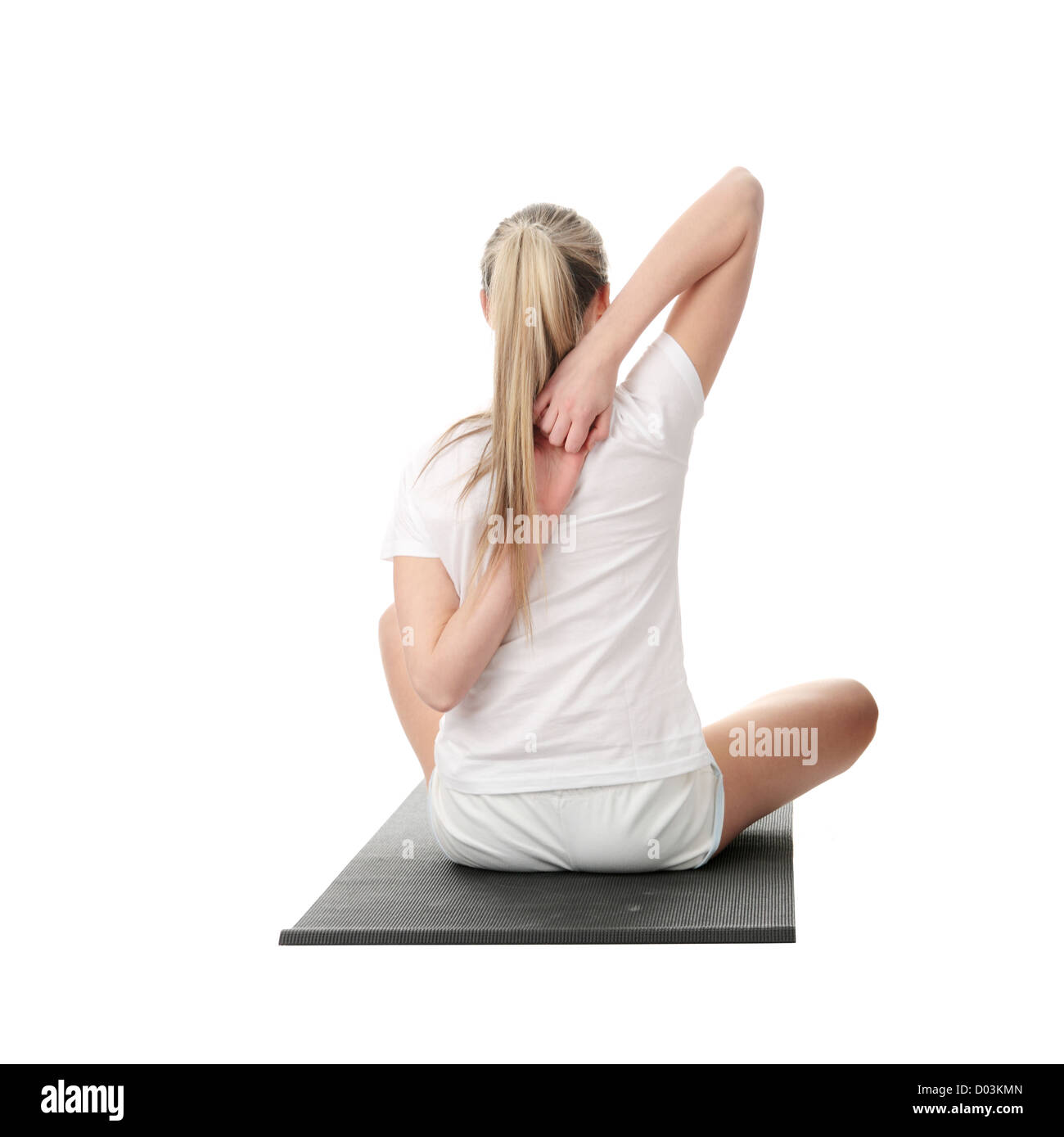 Young woman exercising isolated on white background Stock Photo - Alamy