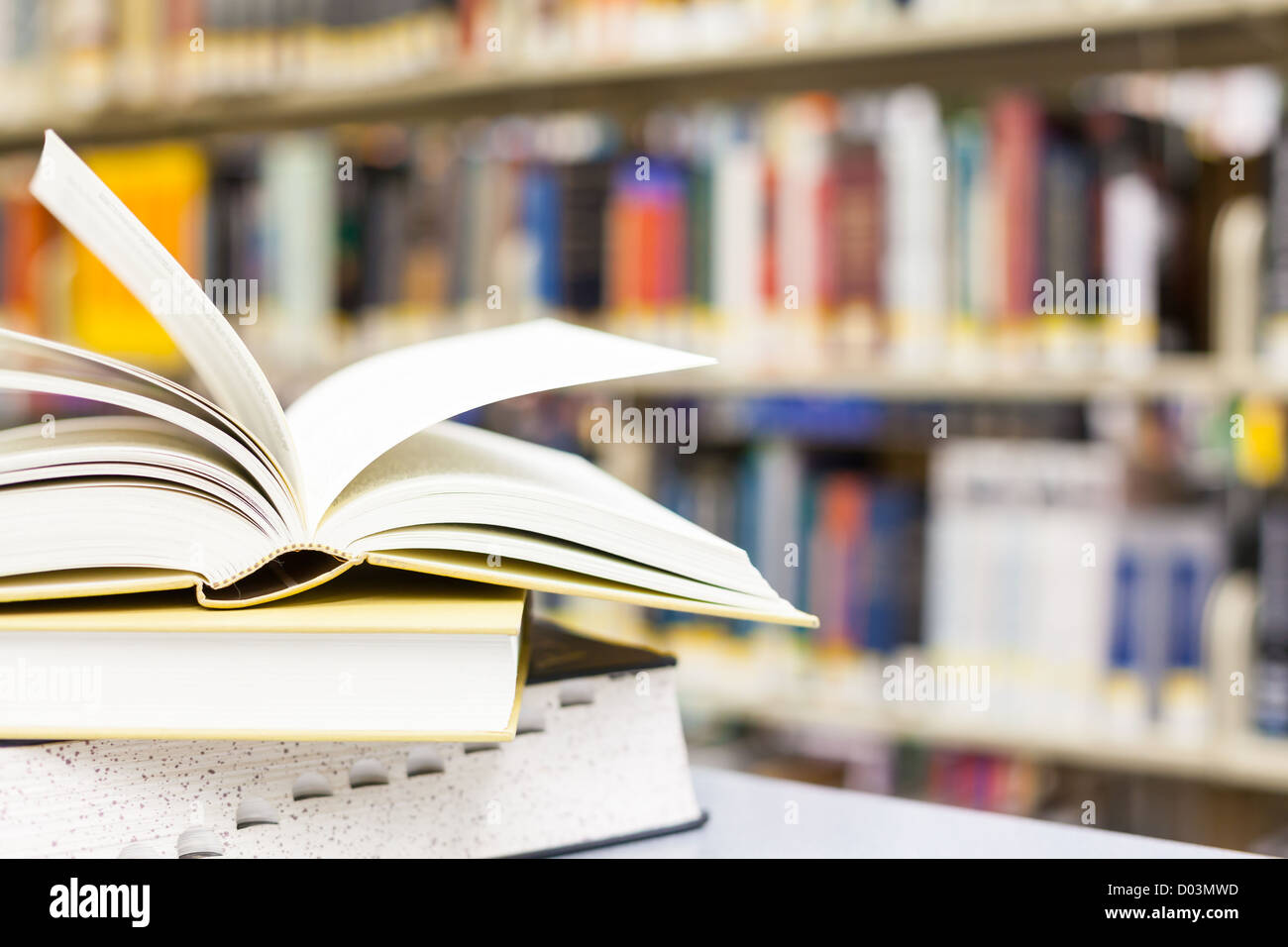 Books and textbooks shown in a school setting / library setting (book ...
