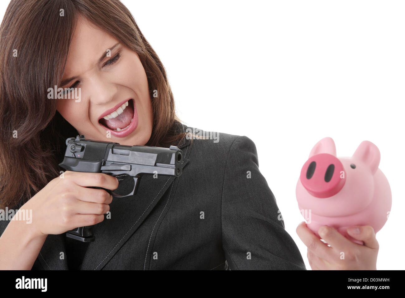 Businesswoman with gun pointing at piggy bank isolated on white Stock ...