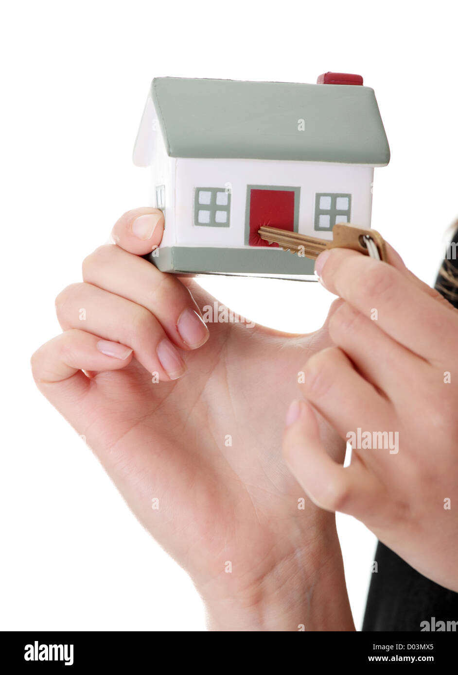 Young businesswoman (real estate agent) with hose model and keys Stock ...