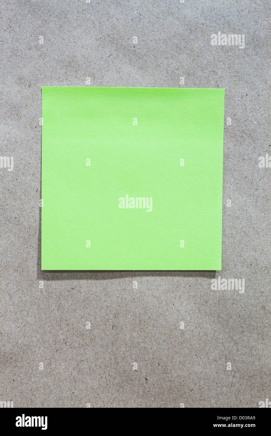 Brown gradient paper background with green note paper Stock Photo - Alamy