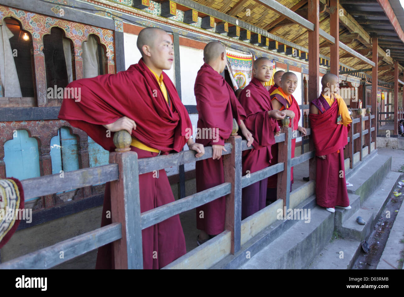 A group of monks standing outside the monastery in Bhutan Stock Photo ...