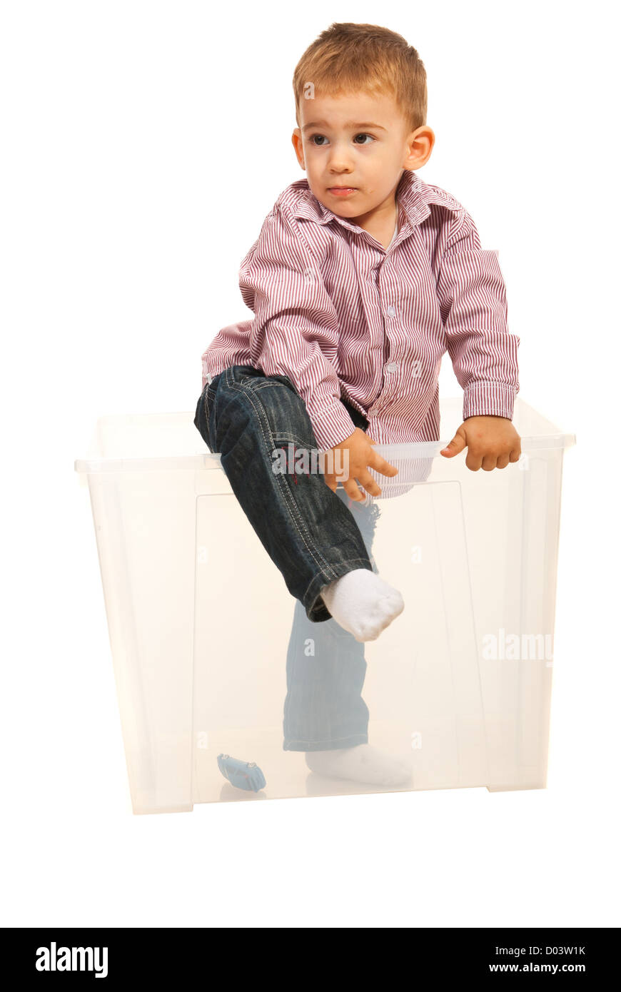 Full length of boy coming out from a transparent box isolated on white ...