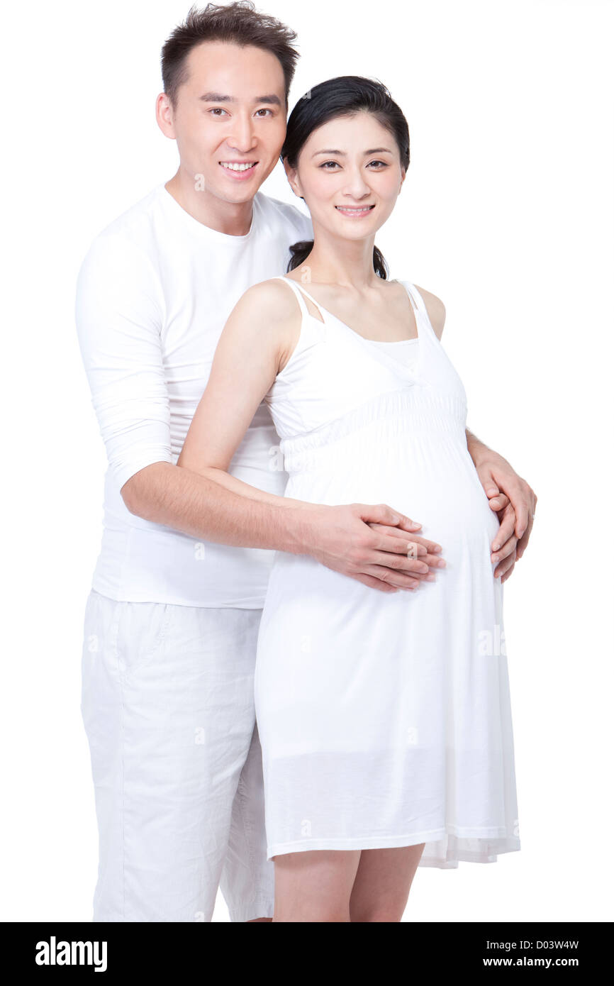 Happy young couple expecting a baby Stock Photo - Alamy
