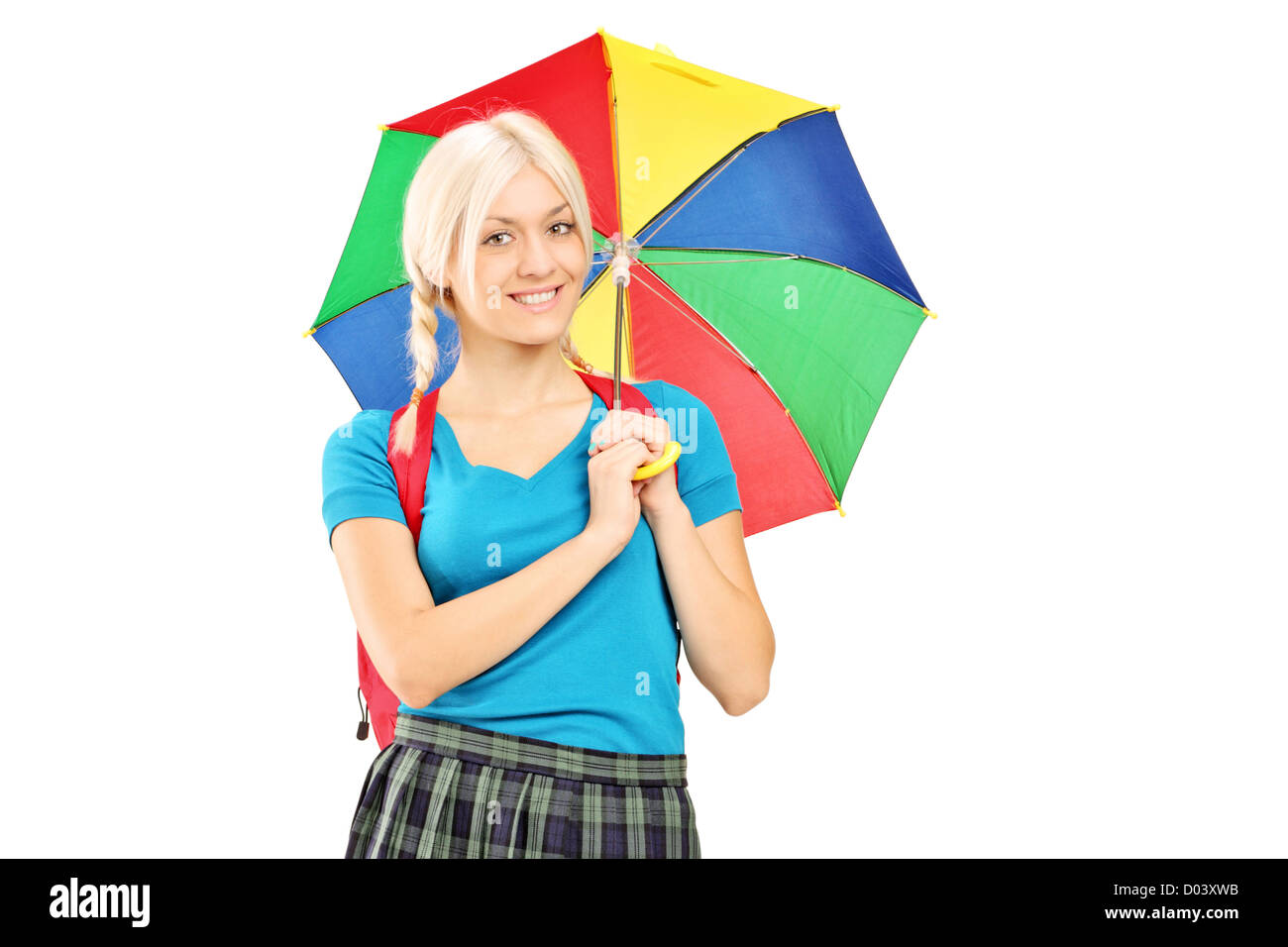 A female student holding an umbrella isolated against white background ...
