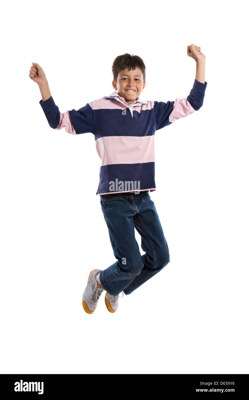 Adorable child jumping on a over white background Stock Photo - Alamy