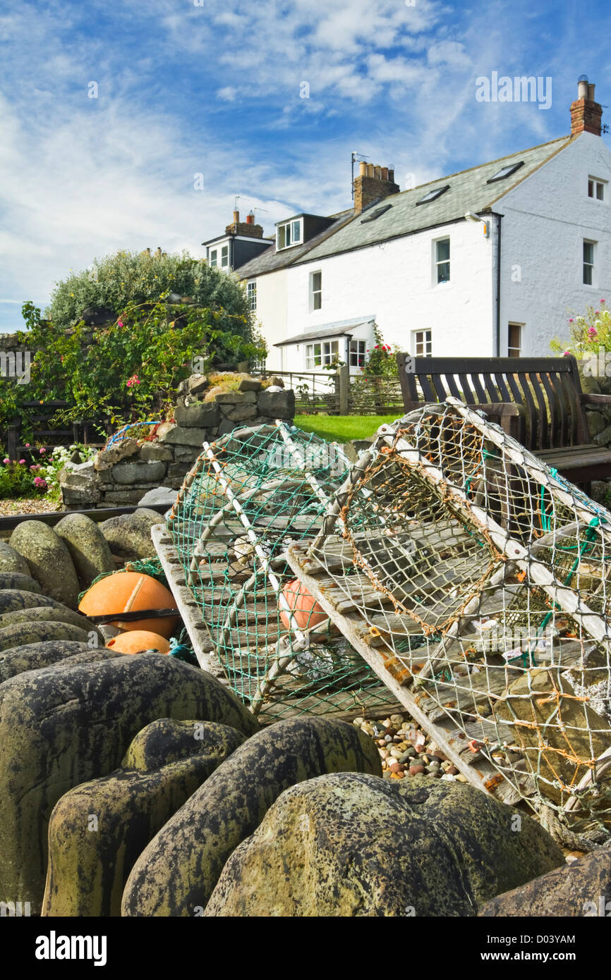 Houses on the seafront in the village of Craster on the Northumberland ...