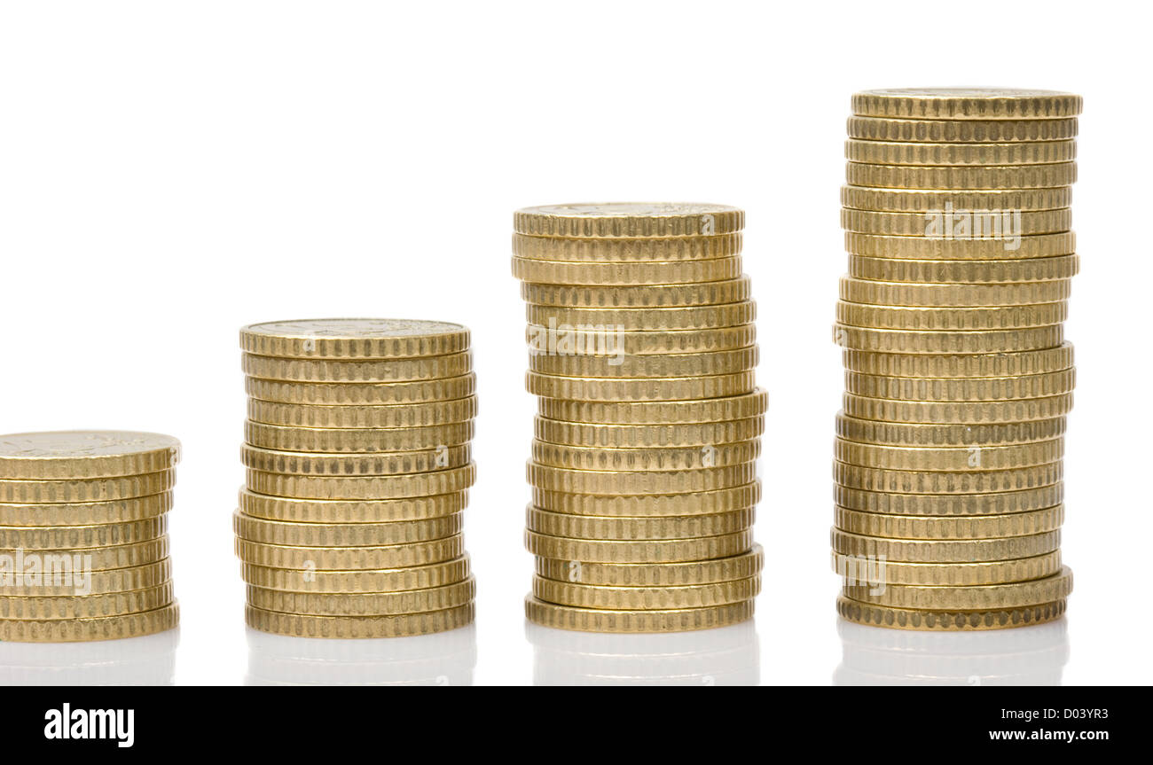 Four piles of money isolated on white Stock Photo - Alamy