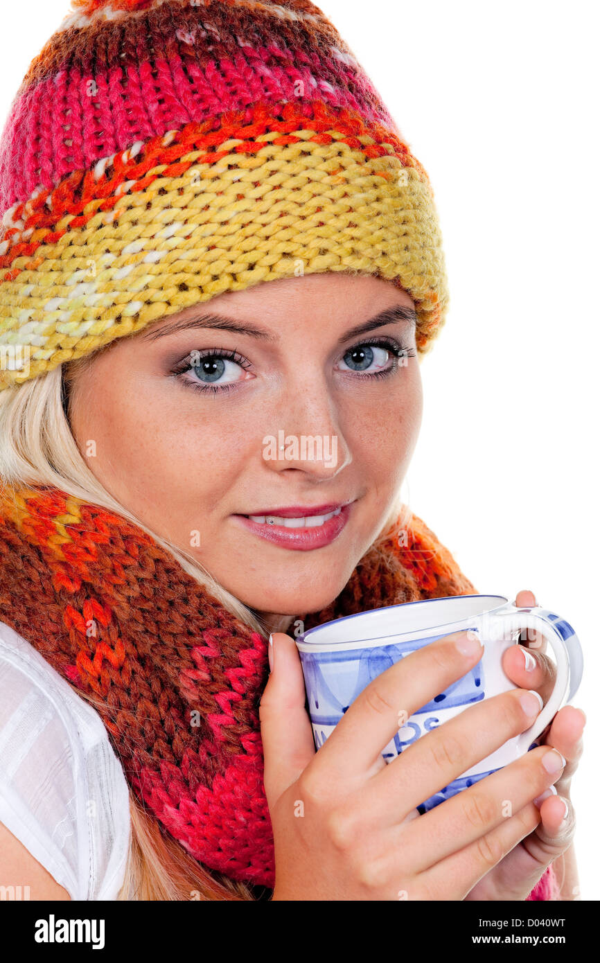 young woman with cap and hot tea Stock Photo - Alamy