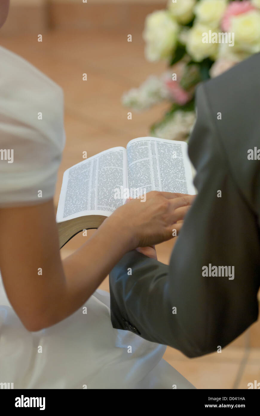 Couple reading Bible during Christian wedding ceremony, Firenze ...