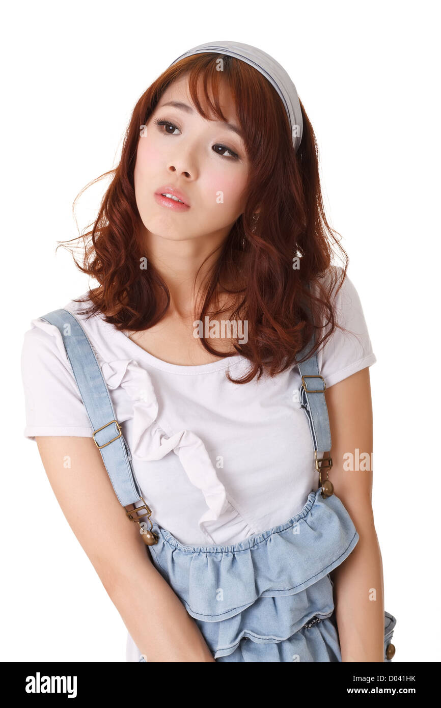 Young woman of Asian with cool expression on face, half length closeup ...