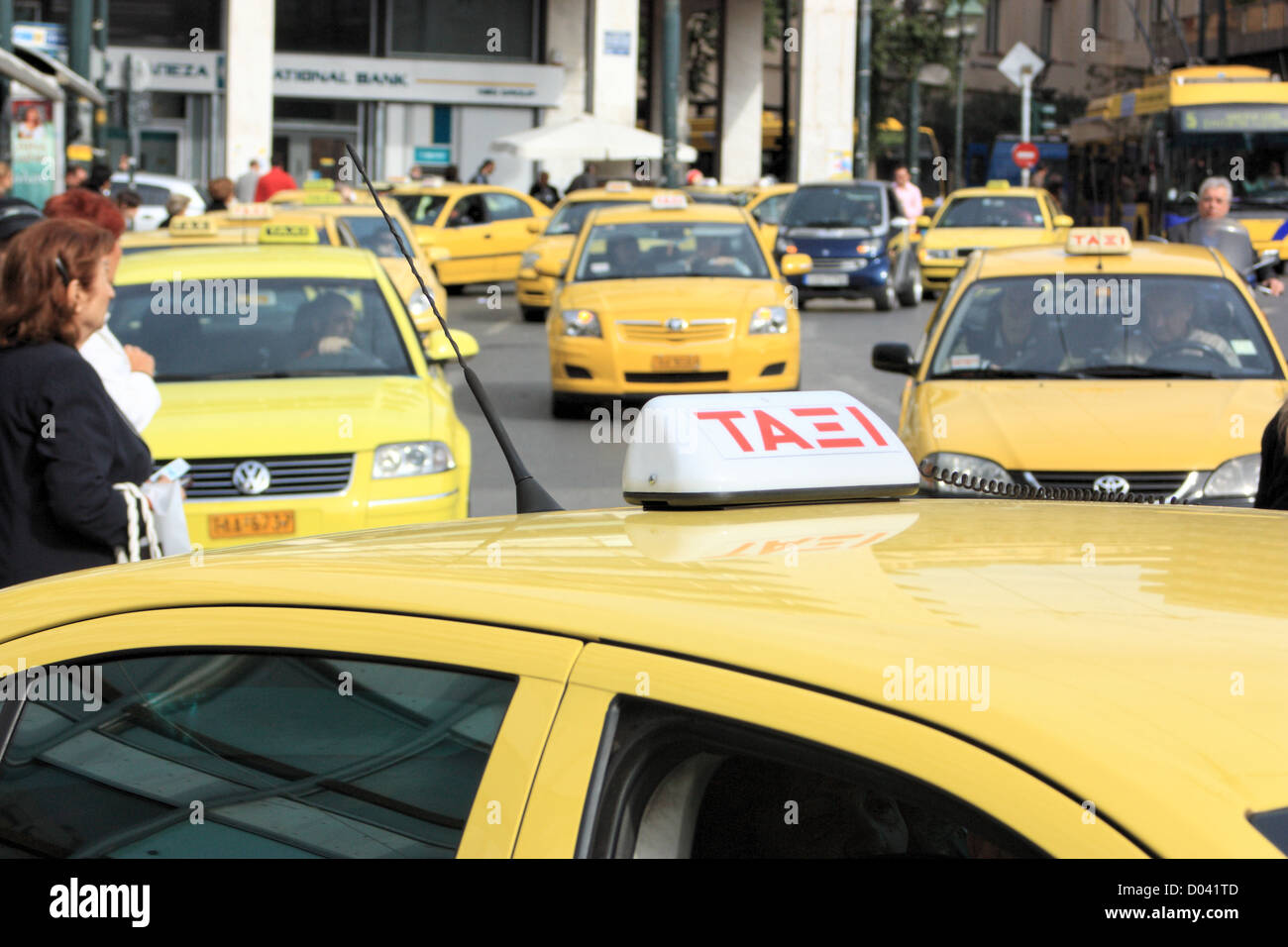 Yellow taxis, Athens, Greece Stock Photo - Alamy