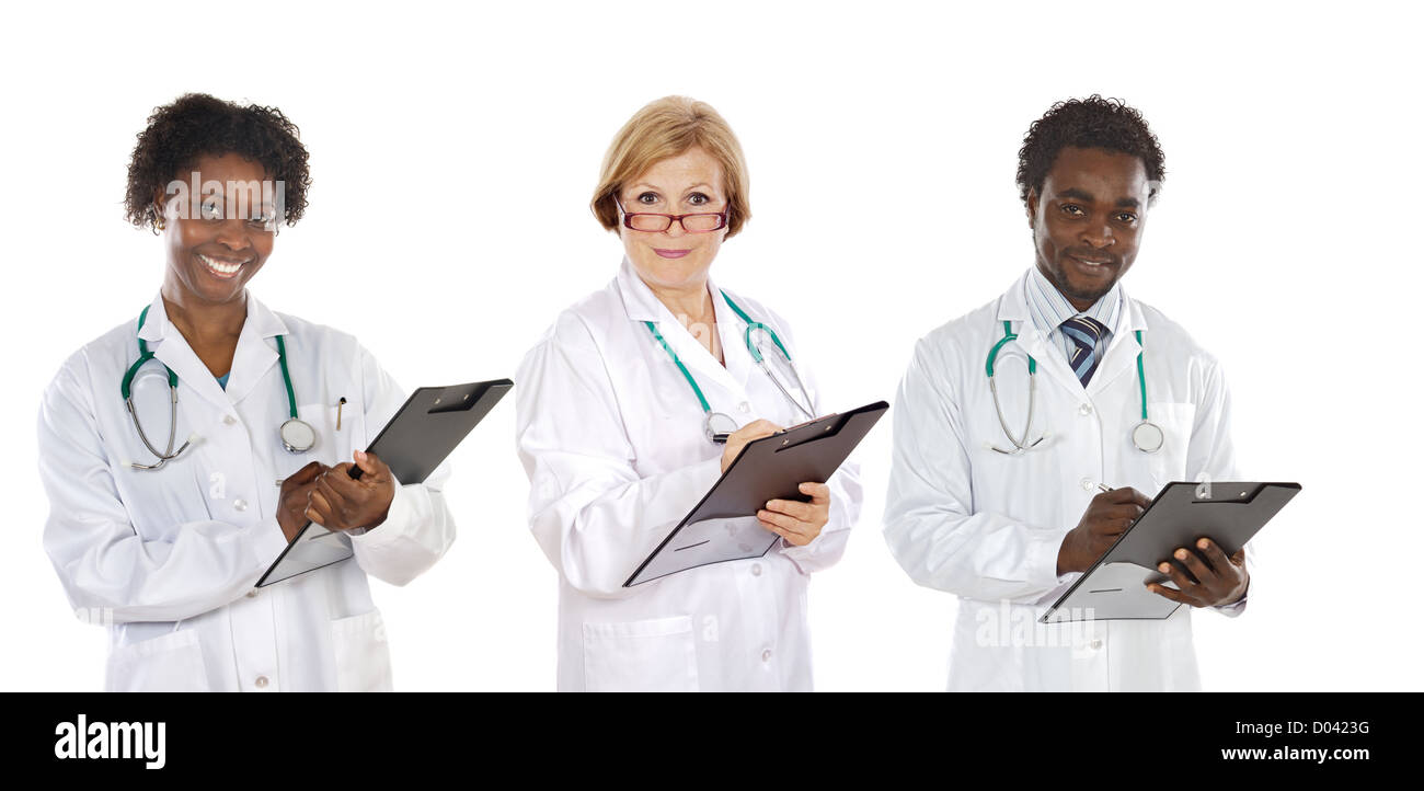 Team of three doctors writing a over white background Stock Photo - Alamy