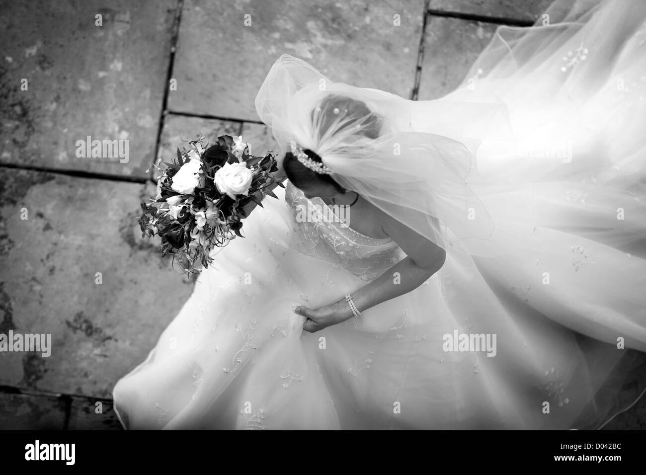 Wedding dress walking Black and White Stock Photos & Images - Alamy