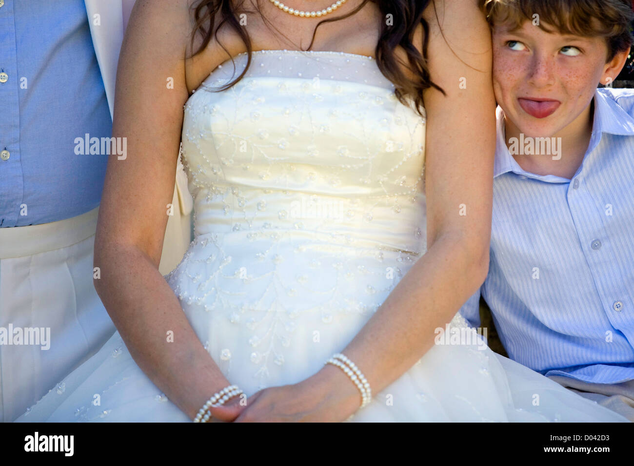 Wedding - Cheeky son sticking his tongue out during wedding Stock Photo ...