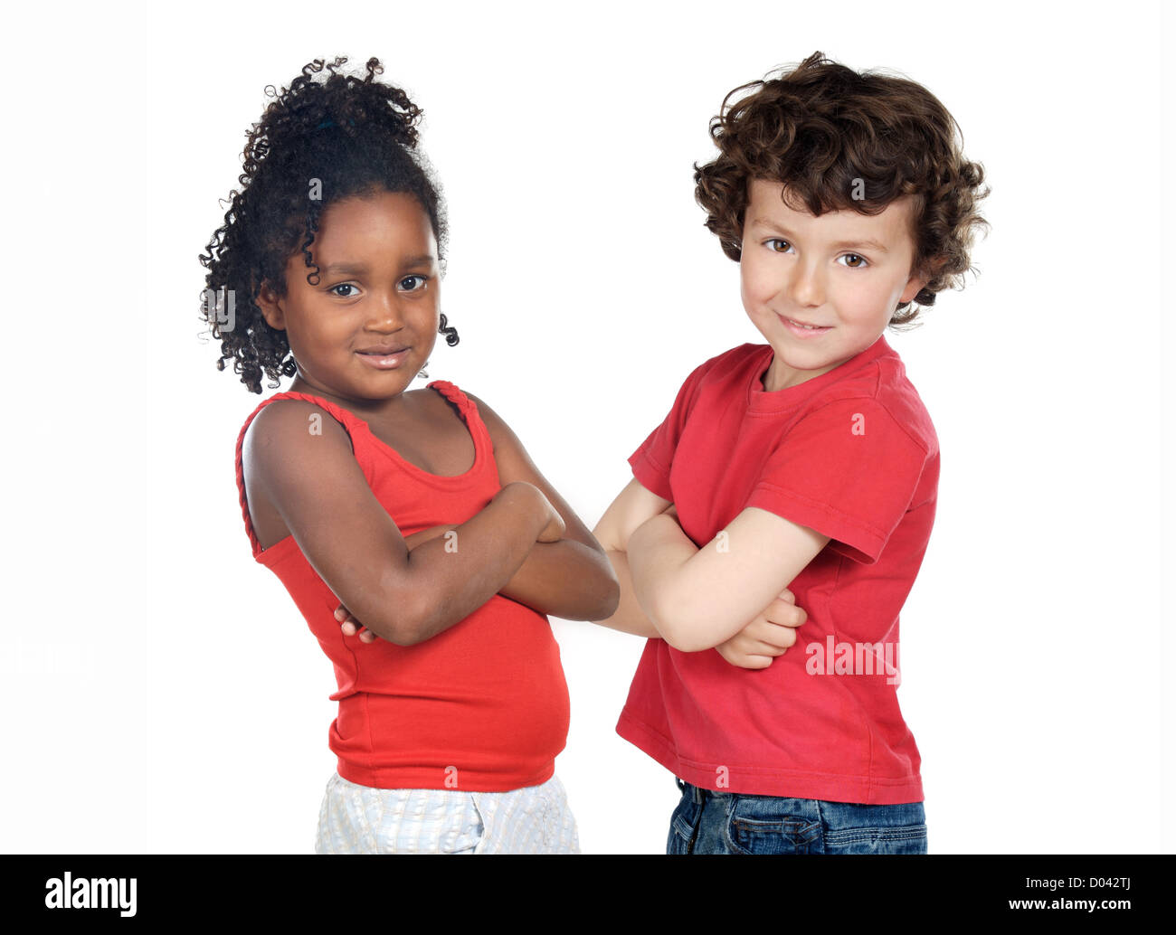Two beautiful children of different races isolated on a over white ...