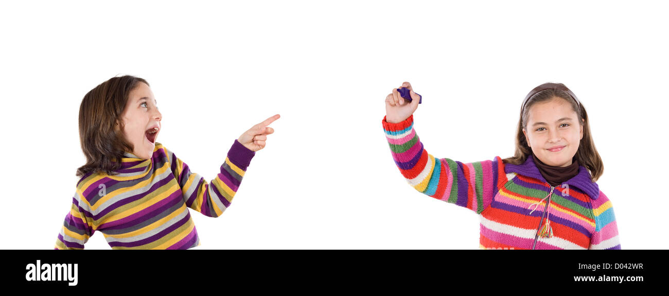 Funny little girl mocking her friend isolated on white Stock Photo - Alamy