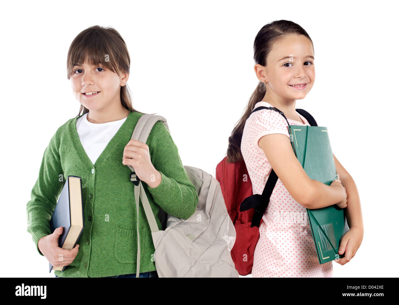 Two girls students returning to school on a white background Stock ...