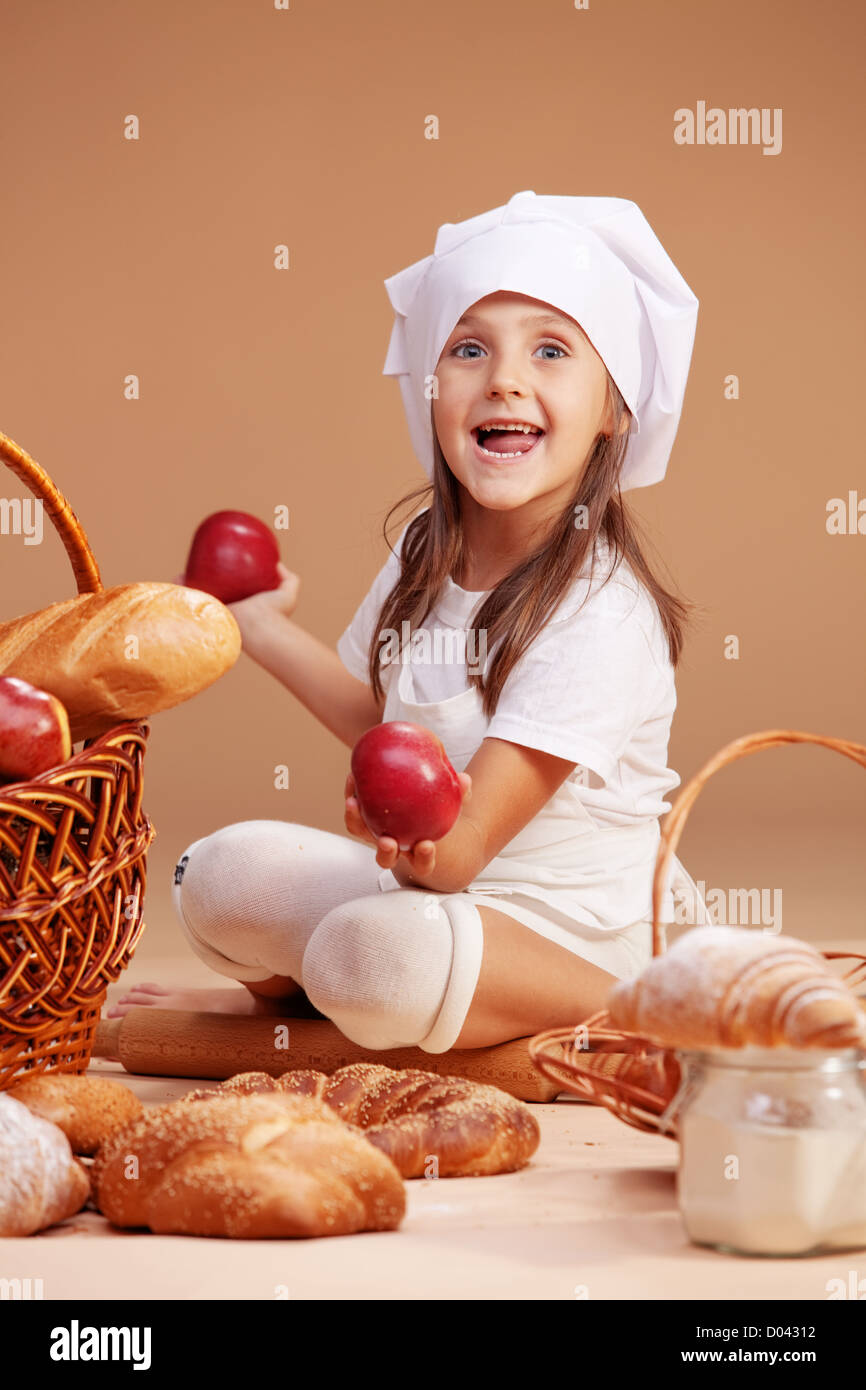 Little cute baker Stock Photo - Alamy