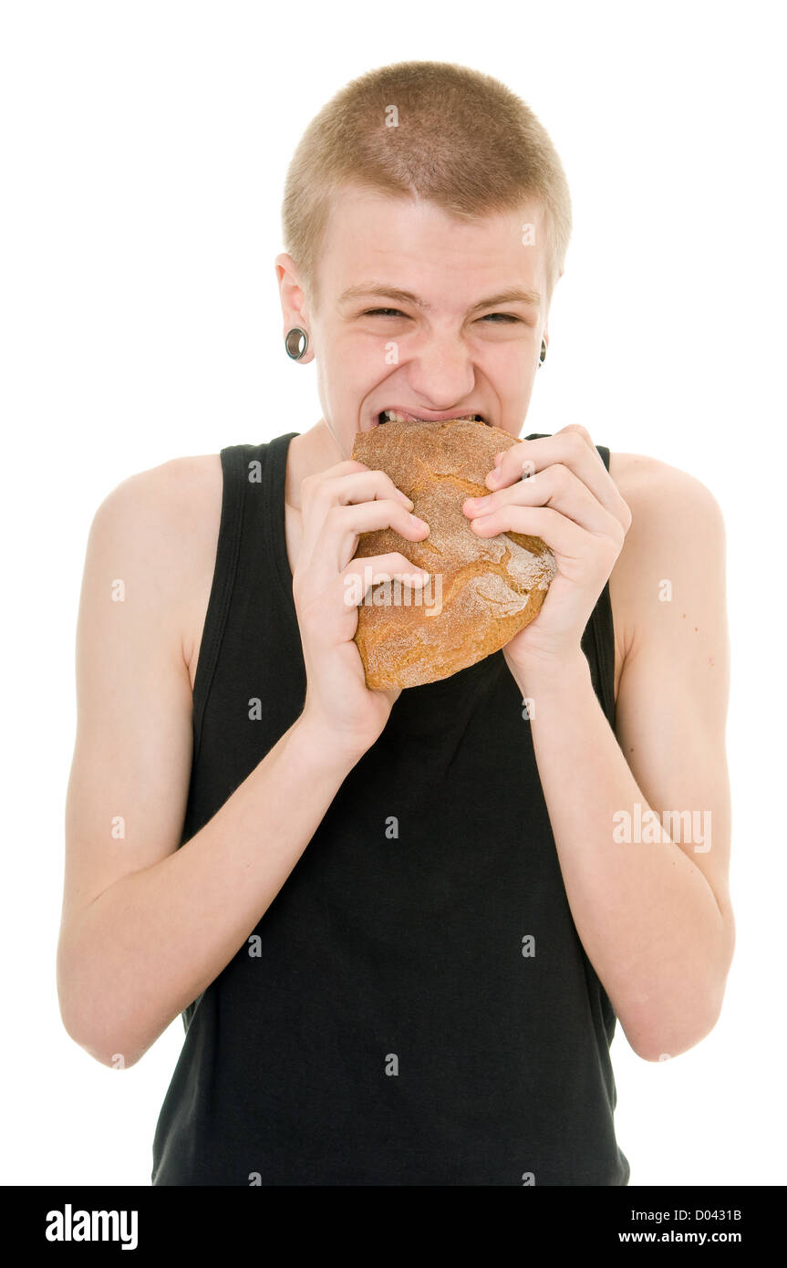 hungry teenager eating bread isolated on white background Stock Photo ...