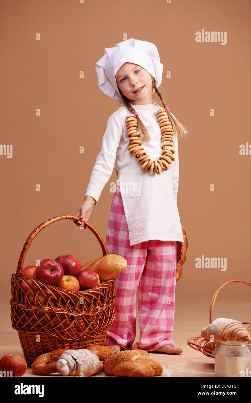 Little cute baker Stock Photo - Alamy