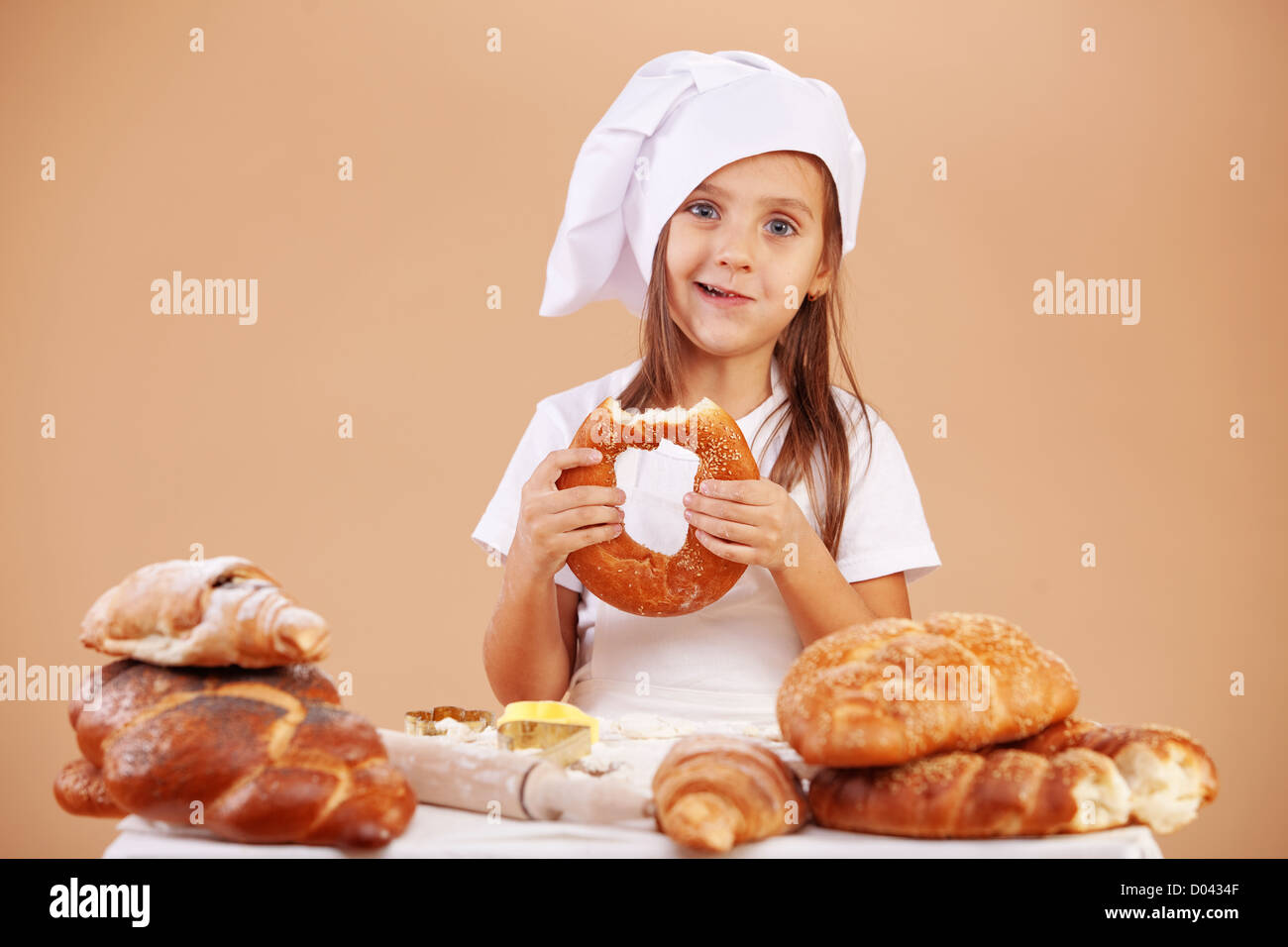 Cute baker hi-res stock photography and images - Alamy
