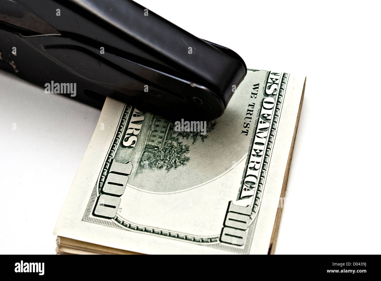 dollars with stapler Stock Photo - Alamy