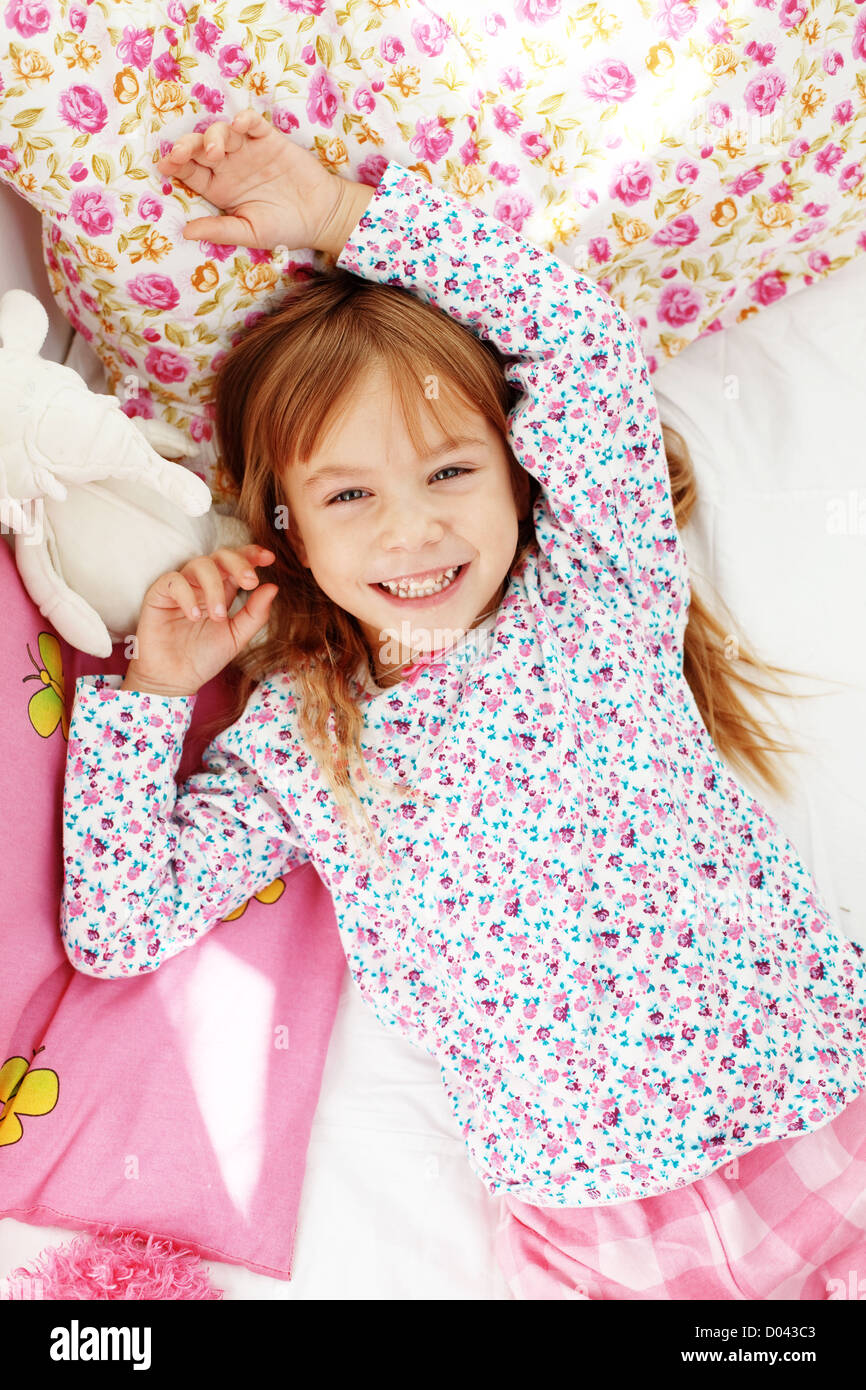 Portrait of child waking up at morning Stock Photo - Alamy