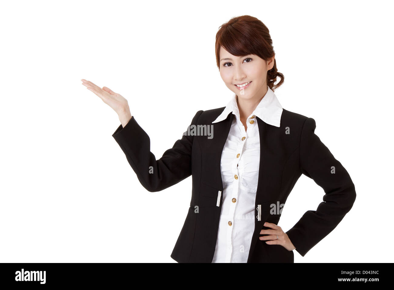 Presenting gesture on smiling business woman, half length closeup ...