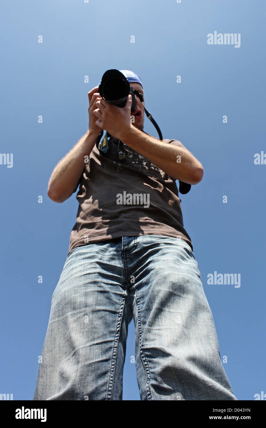 Portrait of a photographer busy at work Stock Photo - Alamy