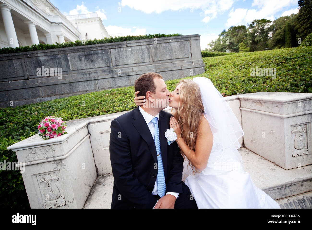 Happy bridal couple enjoying their wedding day park hi-res stock ...