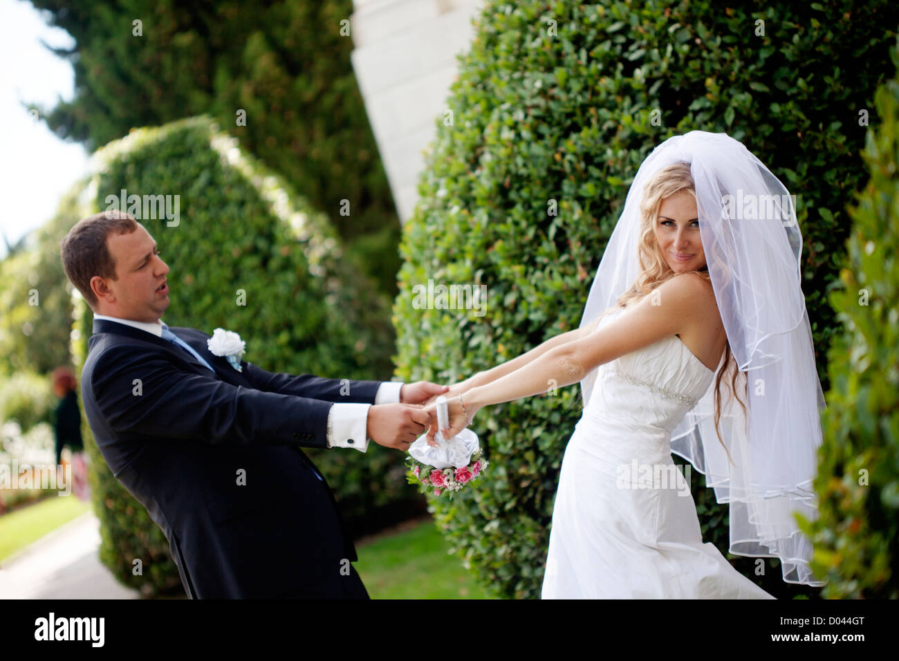Happy bride and groom celebrating their wedding day Stock Photo - Alamy
