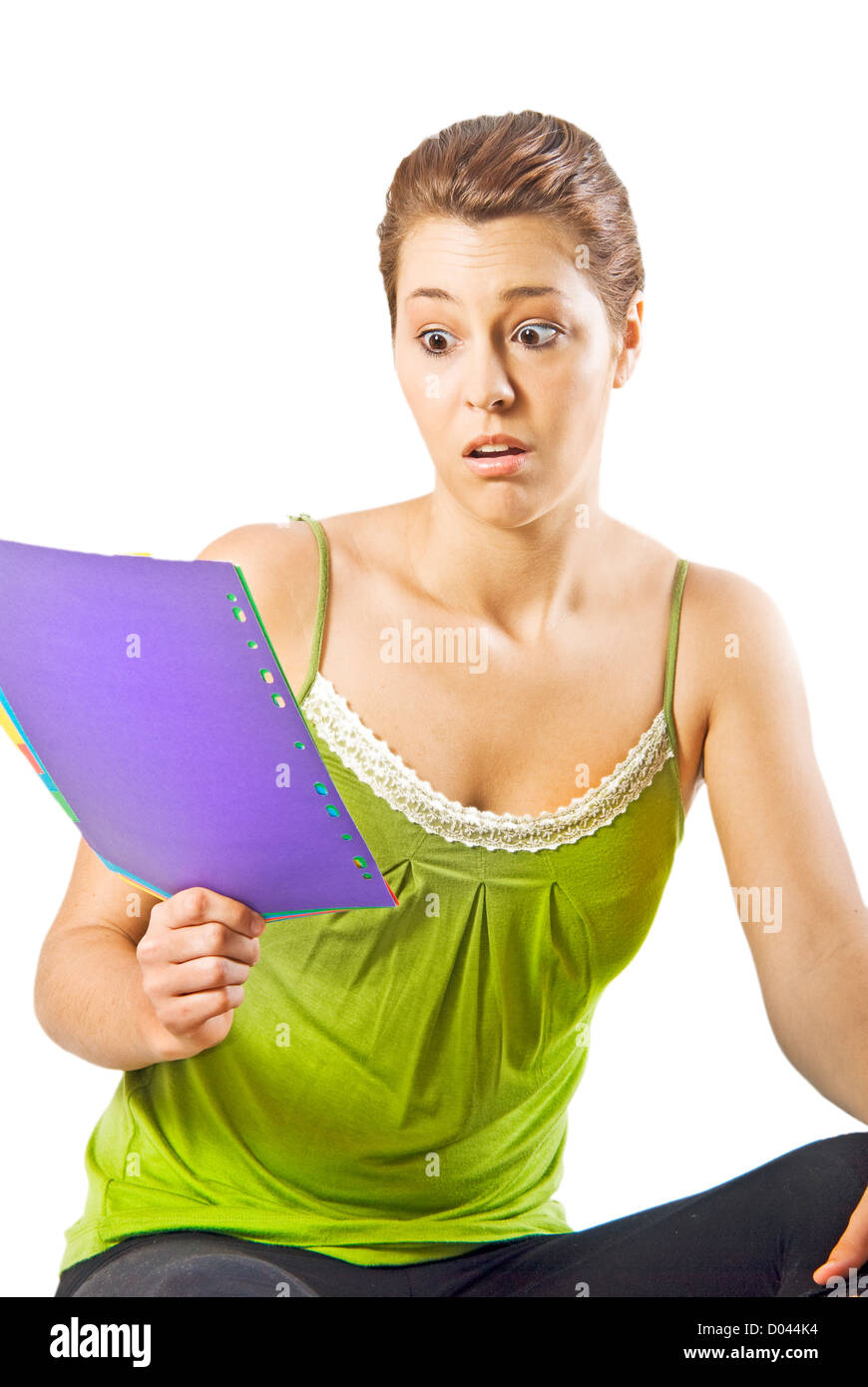 Beautiful young woman reading something shocking - white background ...
