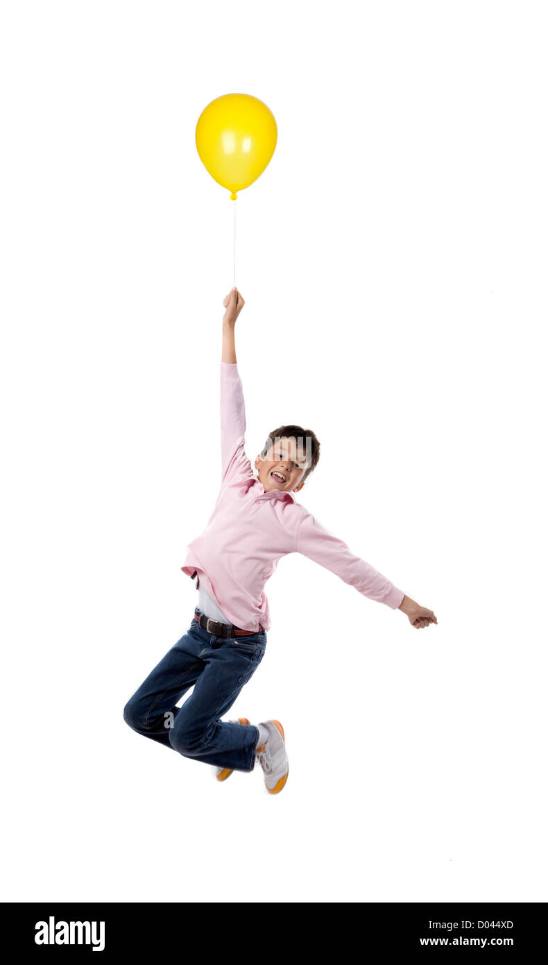 Child flying with yellow balloon inflated isolated on white background ...