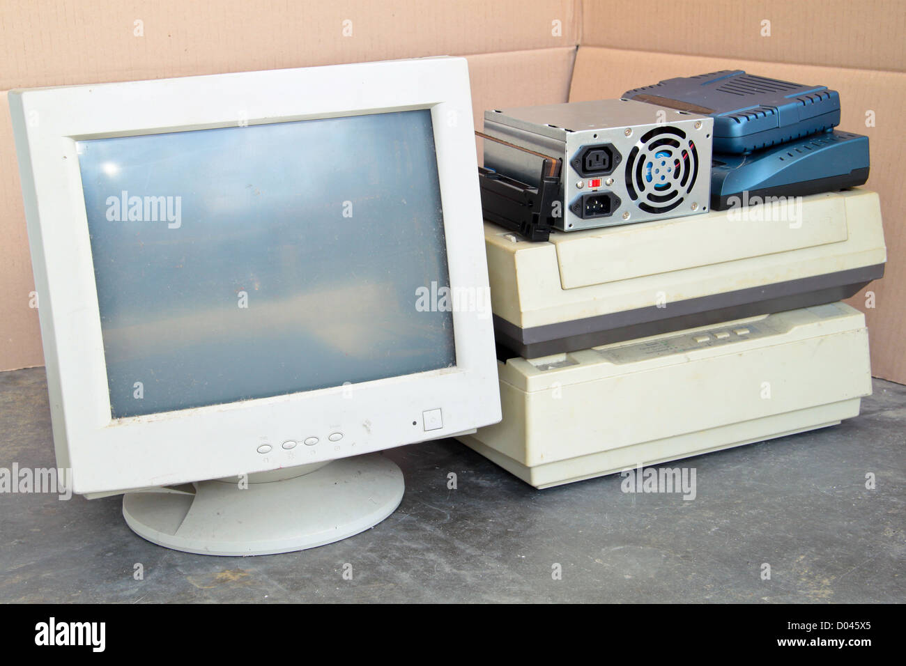 Pile of obsolete and dusty IT equipments Stock Photo - Alamy