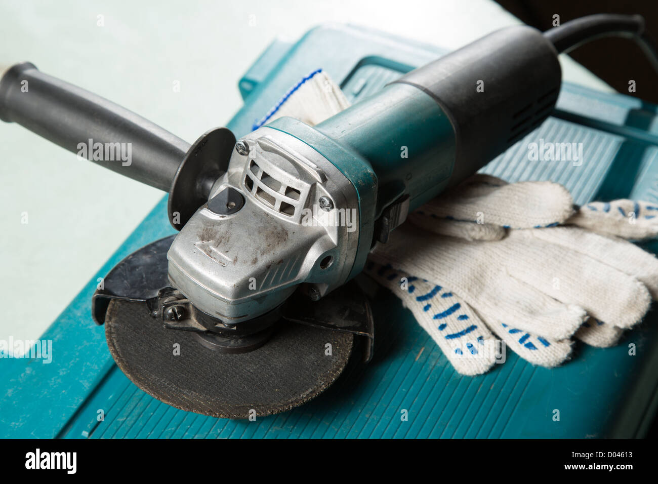 Grinding machine with gloves Stock Photo - Alamy