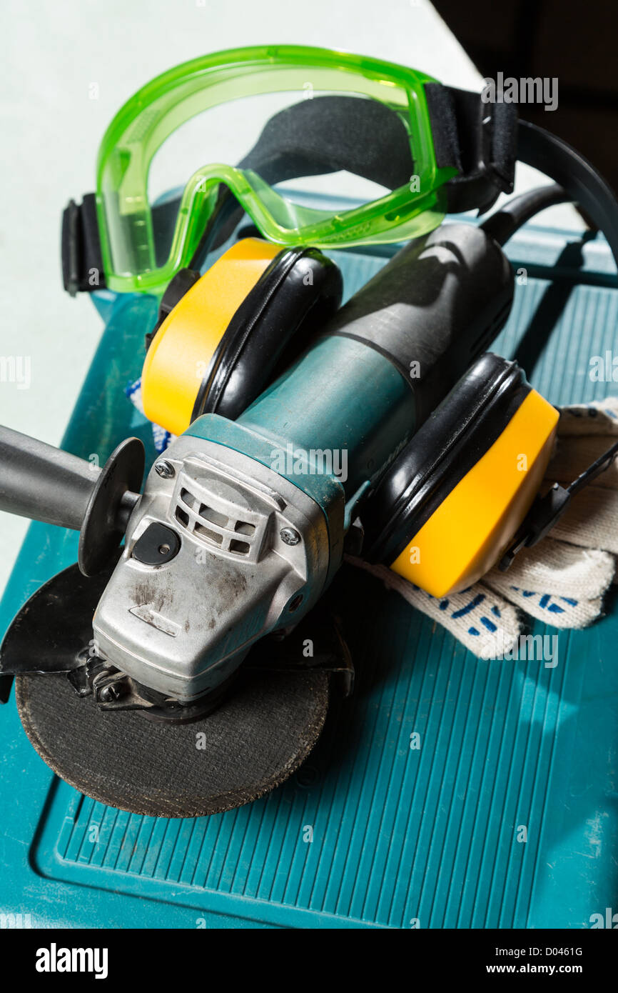 Grinding machine with gloves Stock Photo - Alamy