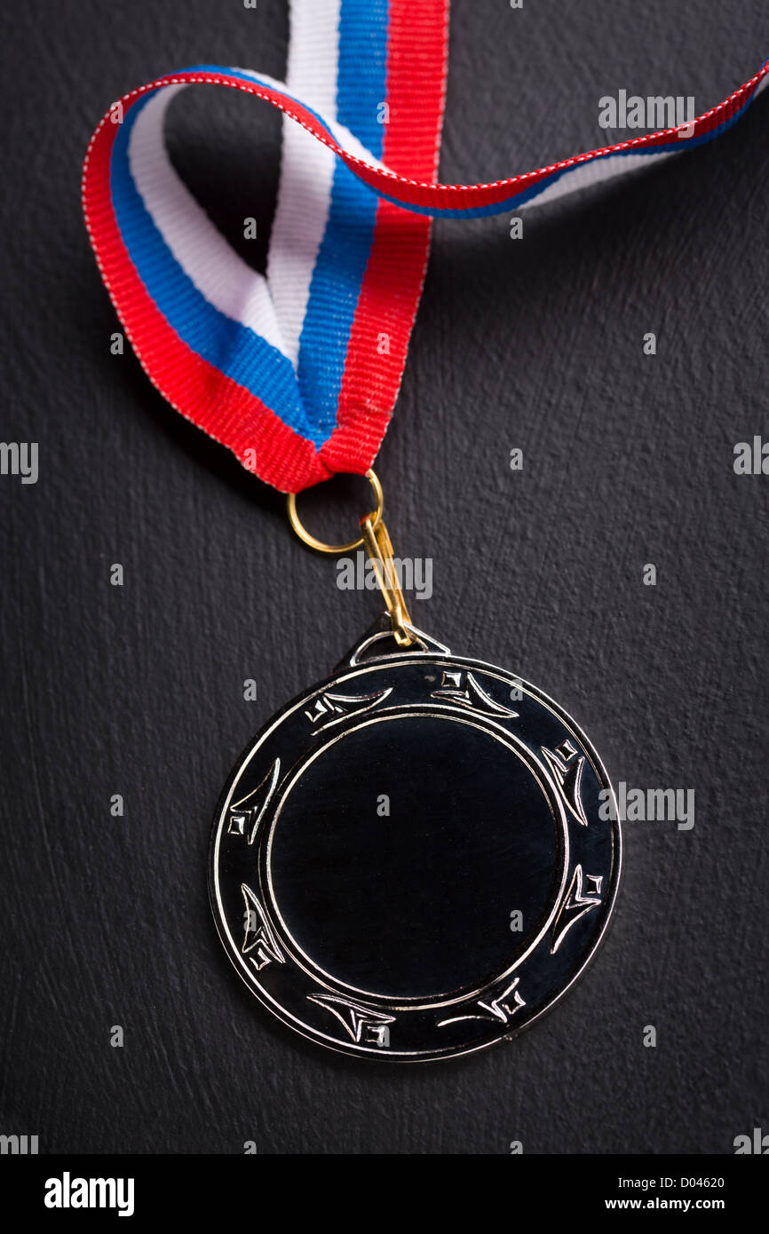 Metal medal with tricolor ribbon Stock Photo - Alamy